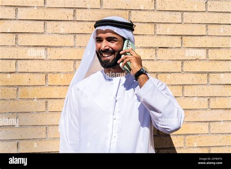 Portrait Of Handsome Arab Businessman Wearing Traditional Emirati