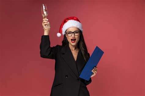 Premium Photo A Girl At A New Years Corporate Party With A Folder In