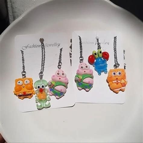 خرید و قیمت گردنبند ست دوستی باب اسفنجی و دوستان شامل سه گردنبند استیل