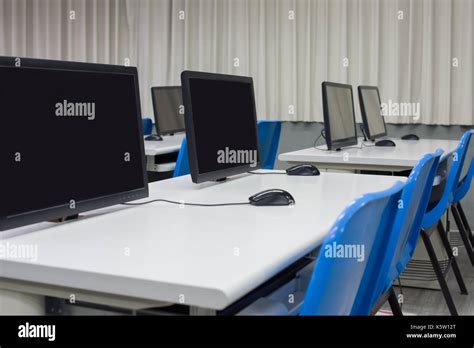 Blurred Background Of Computer Class In University With Nobody Stock