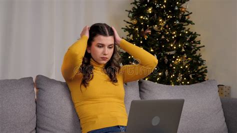 Shocked Businesswoman Looks At Laptop Screen Worried Of Problem Christmas Tree Stock Video