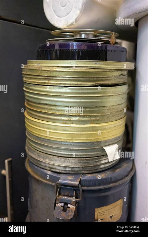 A Collection Of Old Film Reels Is Neatly Stacked On A Container In A Storage Space The Reels