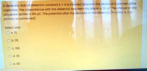 Solved A Dielectric Slab Of Dielectric Constant K 4 Is Inserted