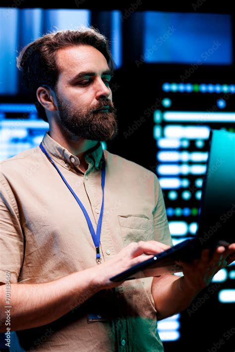 Expert In Server Room With Advanced Data Storage Infrastructure Storing Massive Datasets