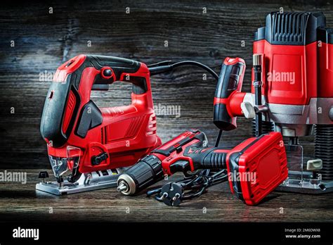 Electric Hand Tools Red Corded Jigsaw Cordless Drill And Small Plunge
