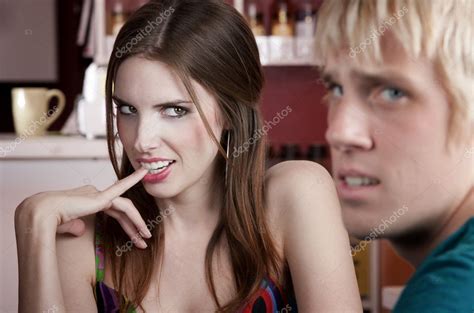 Woman Flirting With Male Friend Stock Photo By Creatista