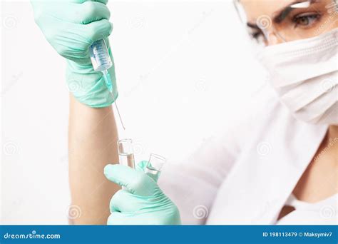 Hands Of The Doctors Filling A Syringe Stock Image Image Of Equipment Immunization 198113479