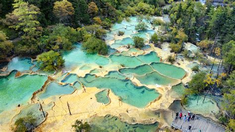 Colorful Water Pools Shimmer In Sw Chinas Autumn Sun Cgtn