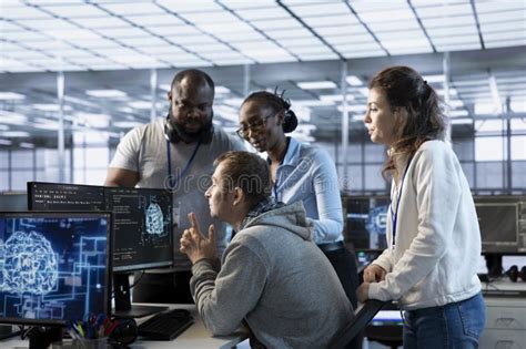 Manager Doing Team Meeting With Data Center Technicians Delegating