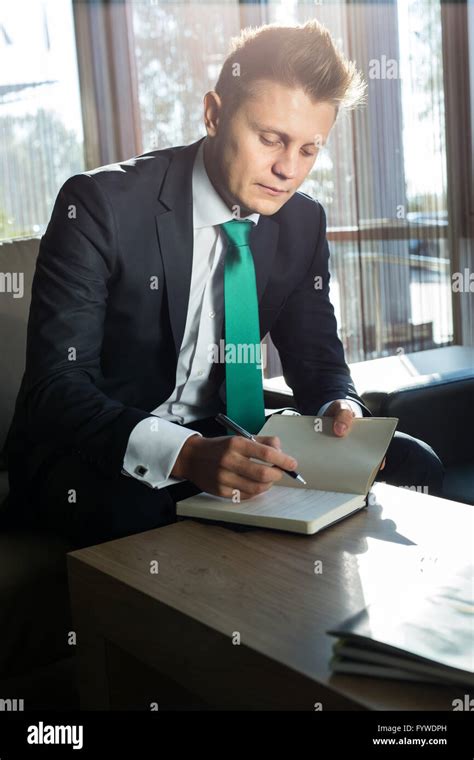 Man With Notebook Stock Photo Alamy