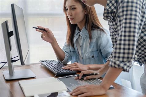 Premium Photo Programmer Working In A Software Development And Coding Technologies Website