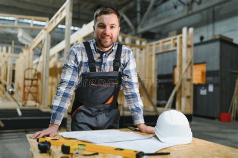 Construction Of Modular Houses An Architect On A Construction Site