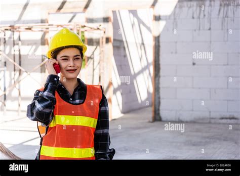 Asian Engineer Foreman Architect Worker Woman Working At Building