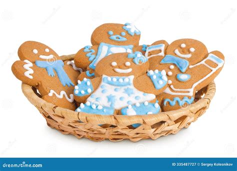 Christmas Gingerbread Cookie In A Wicker Basket Isolated On White