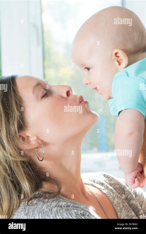 Son And Mother In The Kitchen Stock Photo Alamy