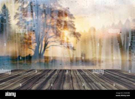 Autumn Background With Defocused Landscape Through Rain Dripping Wet Glass Stock Photo Alamy