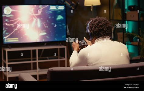 Livid Gamer Raging In Frustration After Losing Mission While Playing