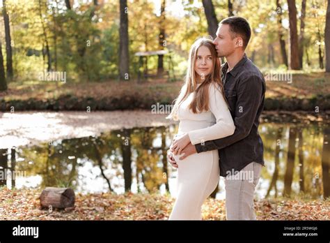 Family day. Stylish marriage pregnant couple waiting for baby. Man is ...