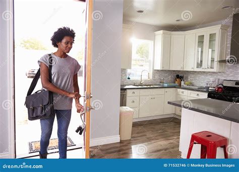 Woman Coming Down The Stairs Under A Porch With Beautiful Sunlight And Big Shadow Royalty-Free ...