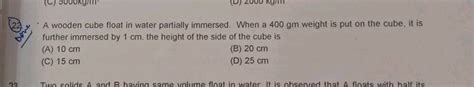 c suuurg 0 20 ny a wooden cube float in water partially immersed