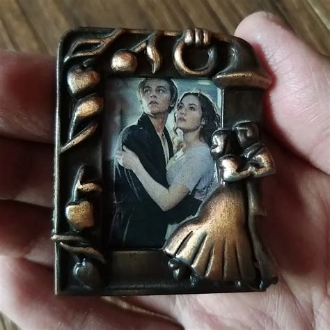 کمدا قیمت و خرید قاب کوچک فلزی رنگ طبق عکس