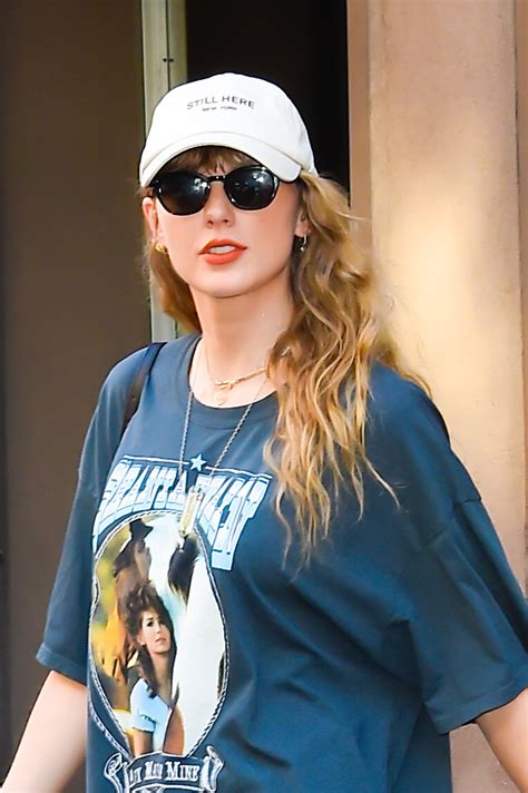 Taylor Swift Has Mastered The Art Of Making Hair Look Good Under A Dad Hat — See Photos Allure