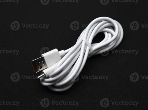 White Charging Cable On A Black Background Usb Cable Stock Photo At Vecteezy