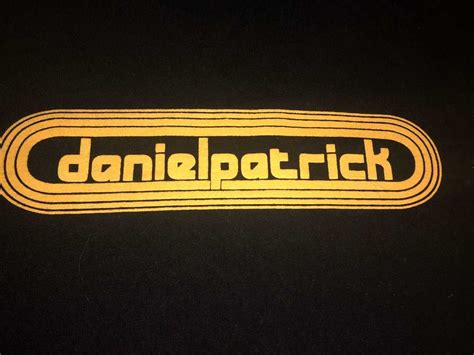Daniel Patrick Daniel Patrick Yellow Logo T Gem