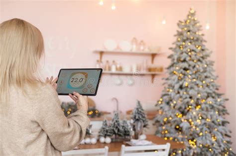 Woman At Home Using Smart Screen Automation Domestic System At Christmas Stock Image Image Of