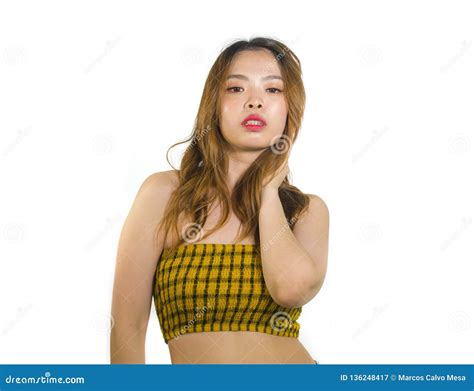 Portrait Of Young And Playful Asian Woman Posing Fresh And Naughty In Korean Pin Up Girl Style