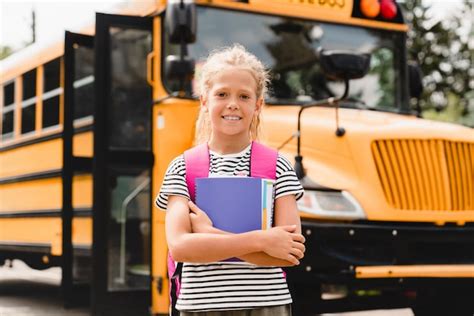 Premium Photo Smart Caucasian Schoolgirl Going Back To School With Books And Copybooks Waiting