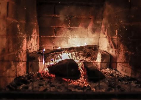 Premium Photo A Fireplace With A Fire In It And The Words Fire In