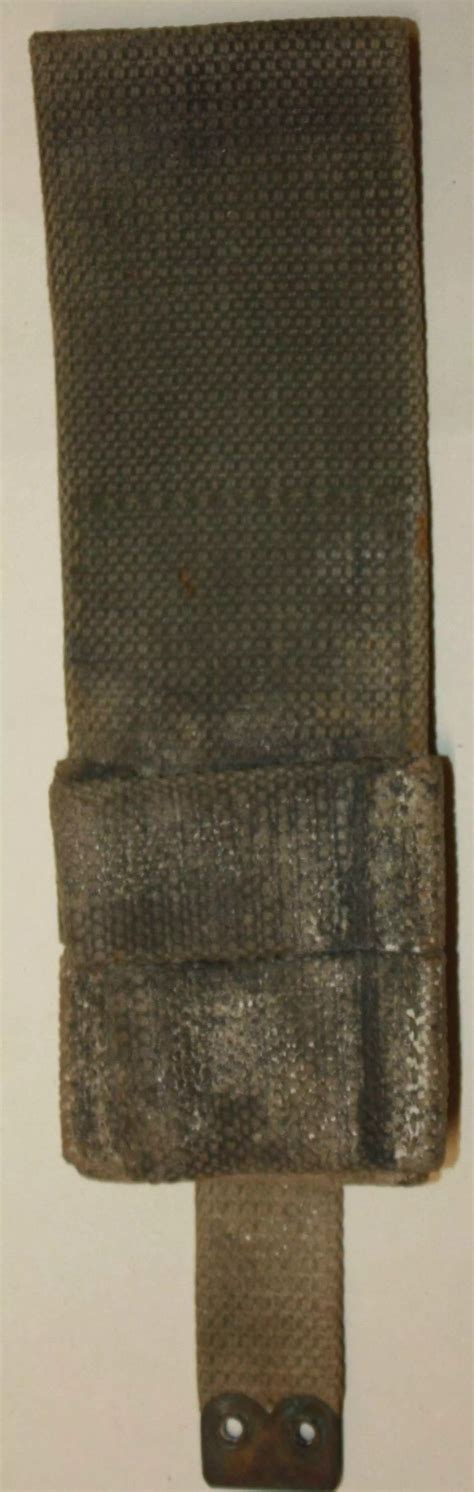 A 1940 Dated 08 Webbing Bayonet Frog With Rear Strap In Webbing
