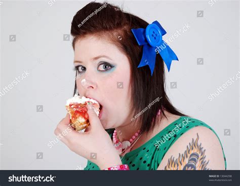 Girl Stuffing Her Face With Cake Stock Photo Shutterstock
