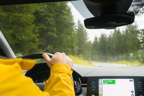 Tourist Drives Car Through Pass In Alps On Rainy Day Editorial Stock
