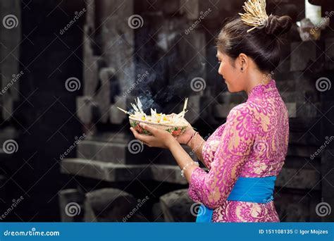 Balinese Woman Wearing A Pink Dress Called Kebaya From Indonesia S