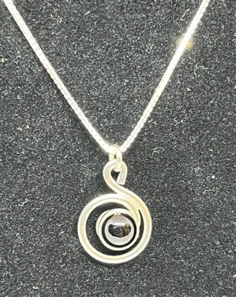 Reflections In Silver Neck Ellen