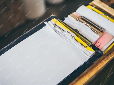 Premium Photo Stack Of Blank Notepad Torn In The Clipboard