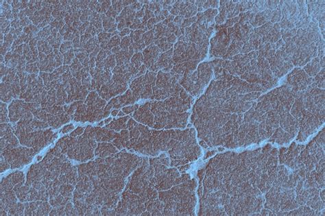 금이 간 콘크리트 표면을 배경으로 프리미엄 사진