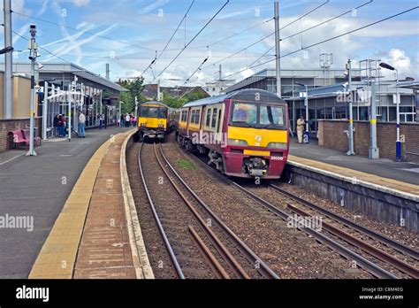 Scotrail Emu Units Class 318 Westbound Left And 320 Eastbound Right