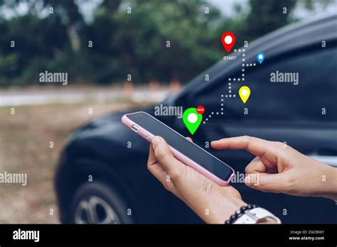 Woman Use Smartphone To Look Up Map Plan Route For Travel Road Trip Concept Stock Photo Alamy