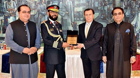 Secretary Senate Mohammad Qasim Samad Khan Presenting A Shield To Syed