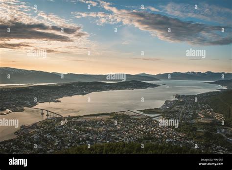 View Of The Sunset Over The Tromso Photo Taken During Midnight Sun