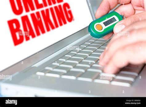 Male Using A Password Generator To Perform Online Banking Security