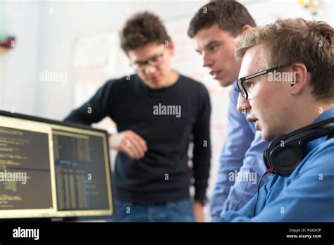 Startup Business Software Developer Working On Desktop Computer Stock