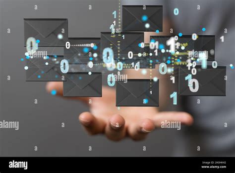 The Hovering Envelopes With Binary Numbers Above The Hand Stock Photo