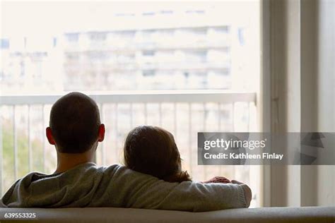 Person Sitting On Couch Back View Photos And Premium High Res Pictures