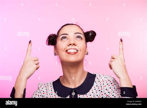 Beautiful Brunette Woman Poiting With Her Finger Stock Photo Alamy