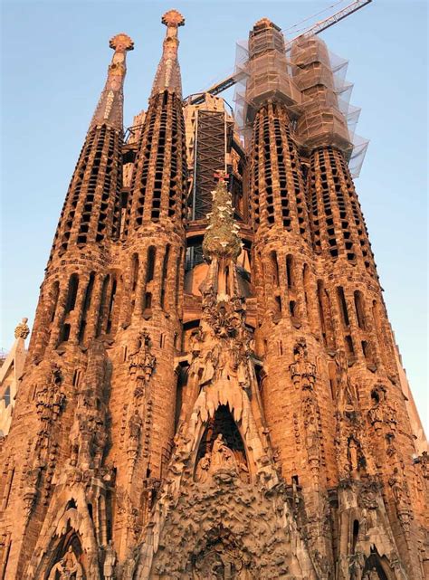 Visiting Gaudís Sagrada Familia Towers Lions In The Piazza