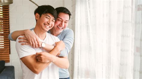 Premium Photo Portraits Of Happy Millennial Asian Gay Couple Hugging